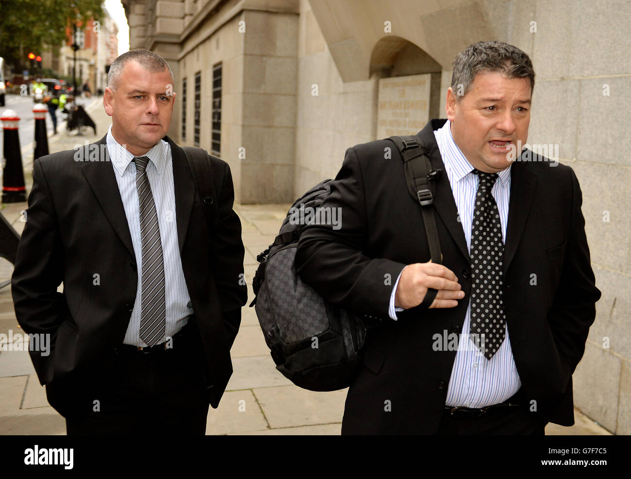 Colin Kaler and Terrence Hughes (right), of the security firm G4S ...