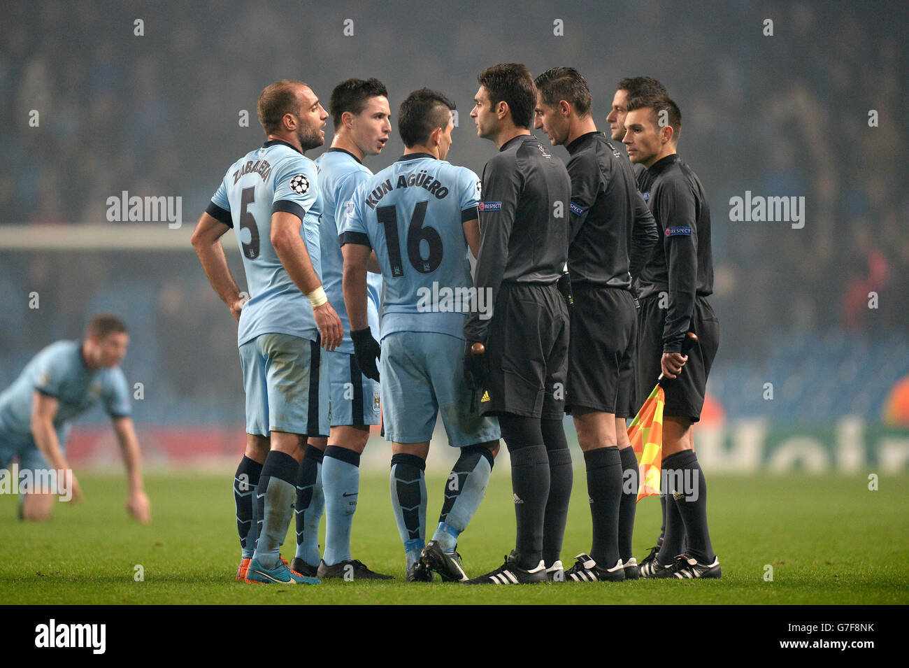 Manchester City players complain to referee Anastasios Sidiropoulos ...