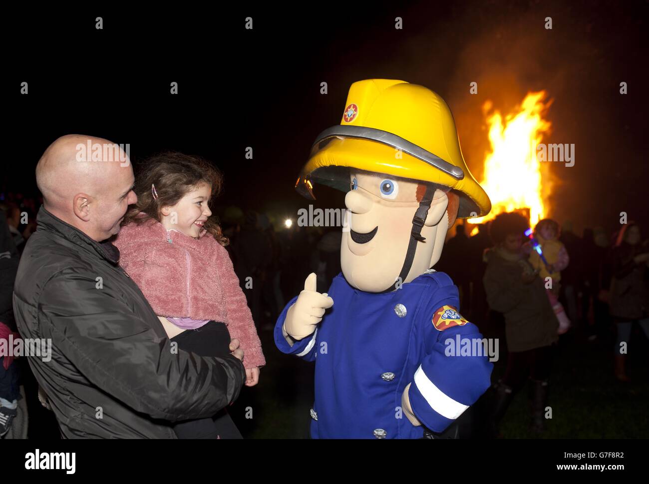 An actor dressed as Fireman Sam meets Georgie Webbon aged 5 from London ...