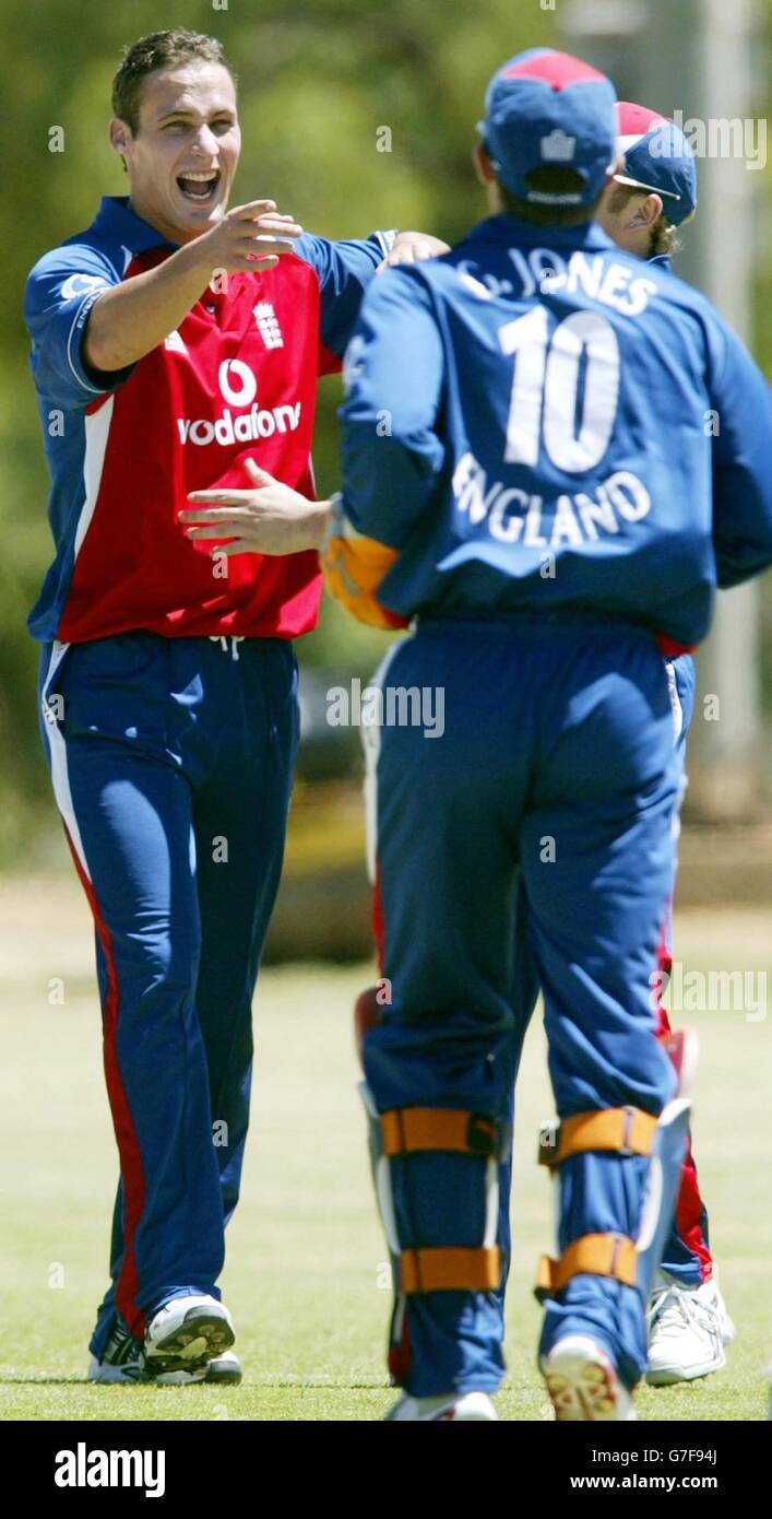 England bowler Simon Jones (left) celebrates taking the wicket of ...