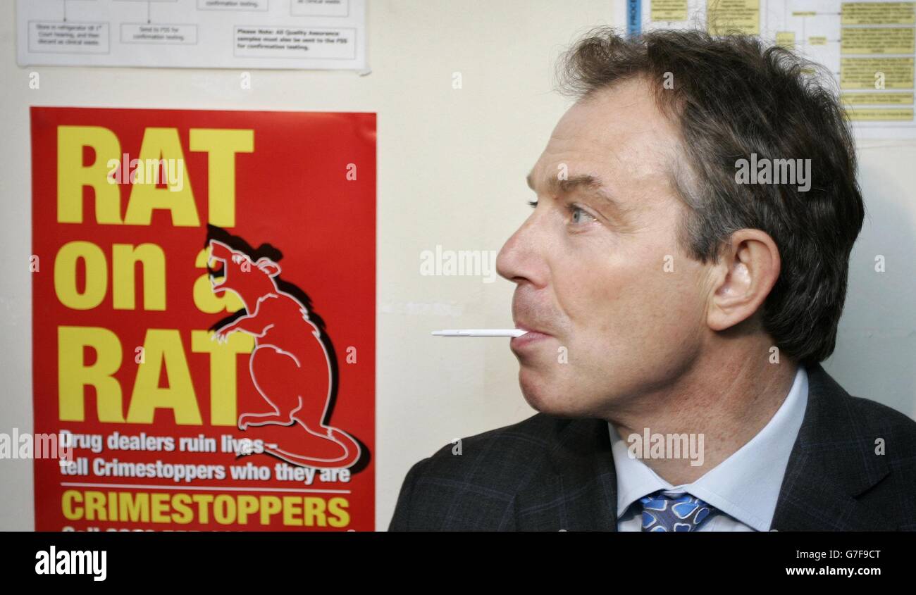 Britain's Prime Minister Tony Blair is seen with a drugs swab in his ...