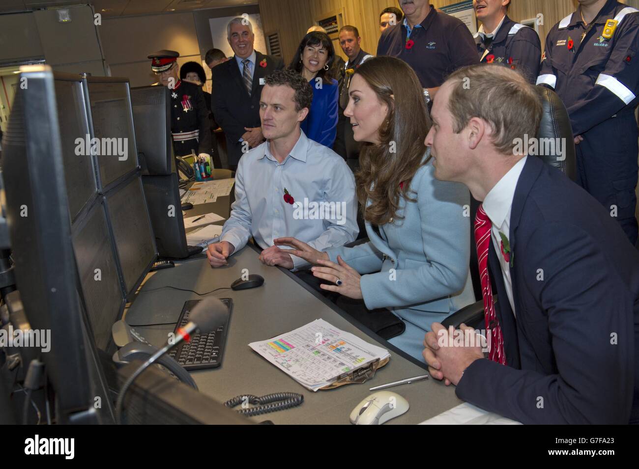 William Richards shows the Duke and Duchess of Cambridge the main ...