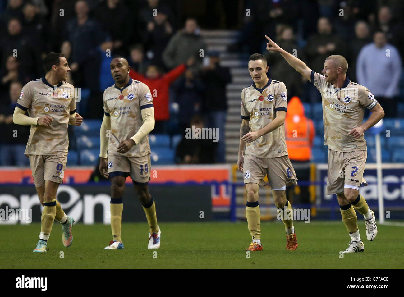 Millwall's Alan Dunne (far right) celebrates scoring their second goal ...
