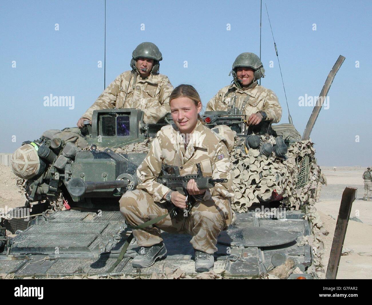 Lance Corporal Jenny Speight on a Scimitar tank after getting engaged ...