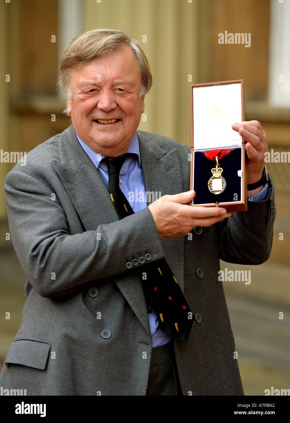 Kenneth Clarke holds his Companion of Honour award after the ...
