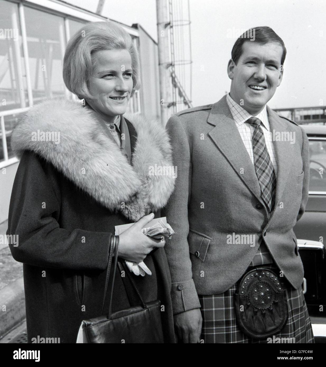 Kilted Kenneth McKellar with his wife Hedy at London Airport when they ...
