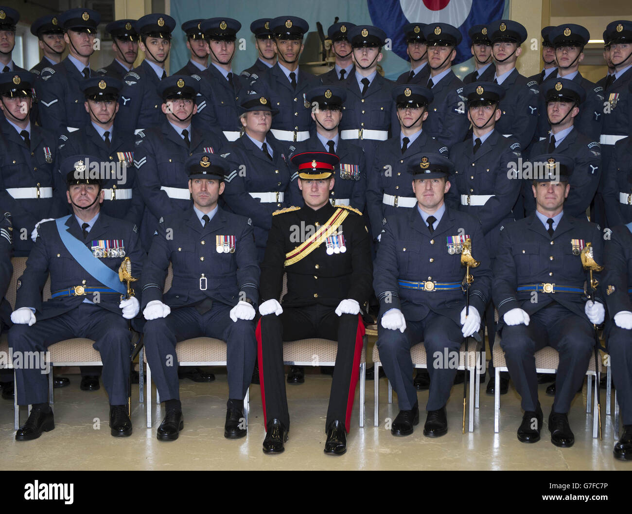 Prince Harry, Honorary Air Commandant, poses for a photograph with 26 ...