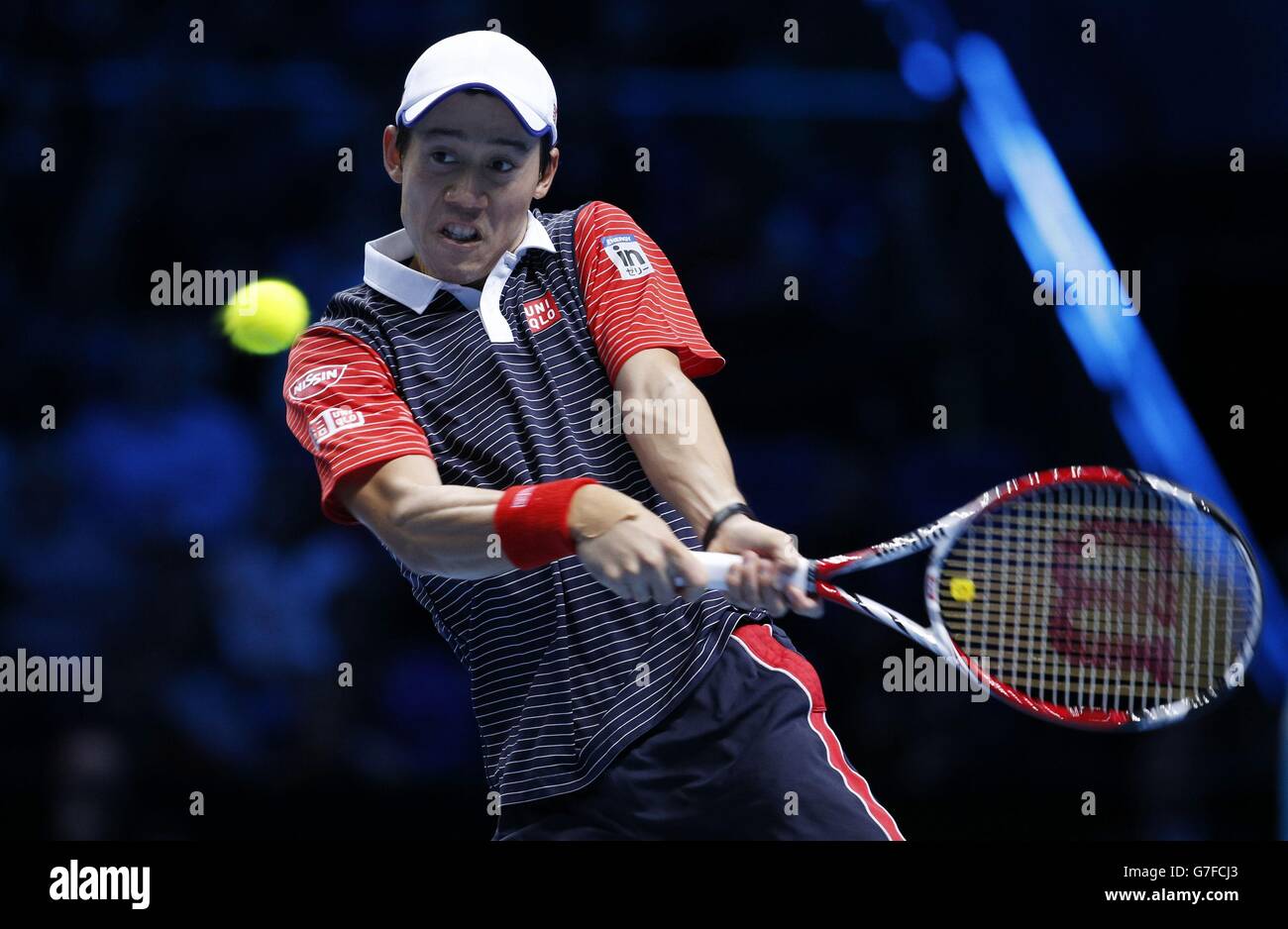 Kei Nishikori competes against David Ferrer during the Barclays ATP ...