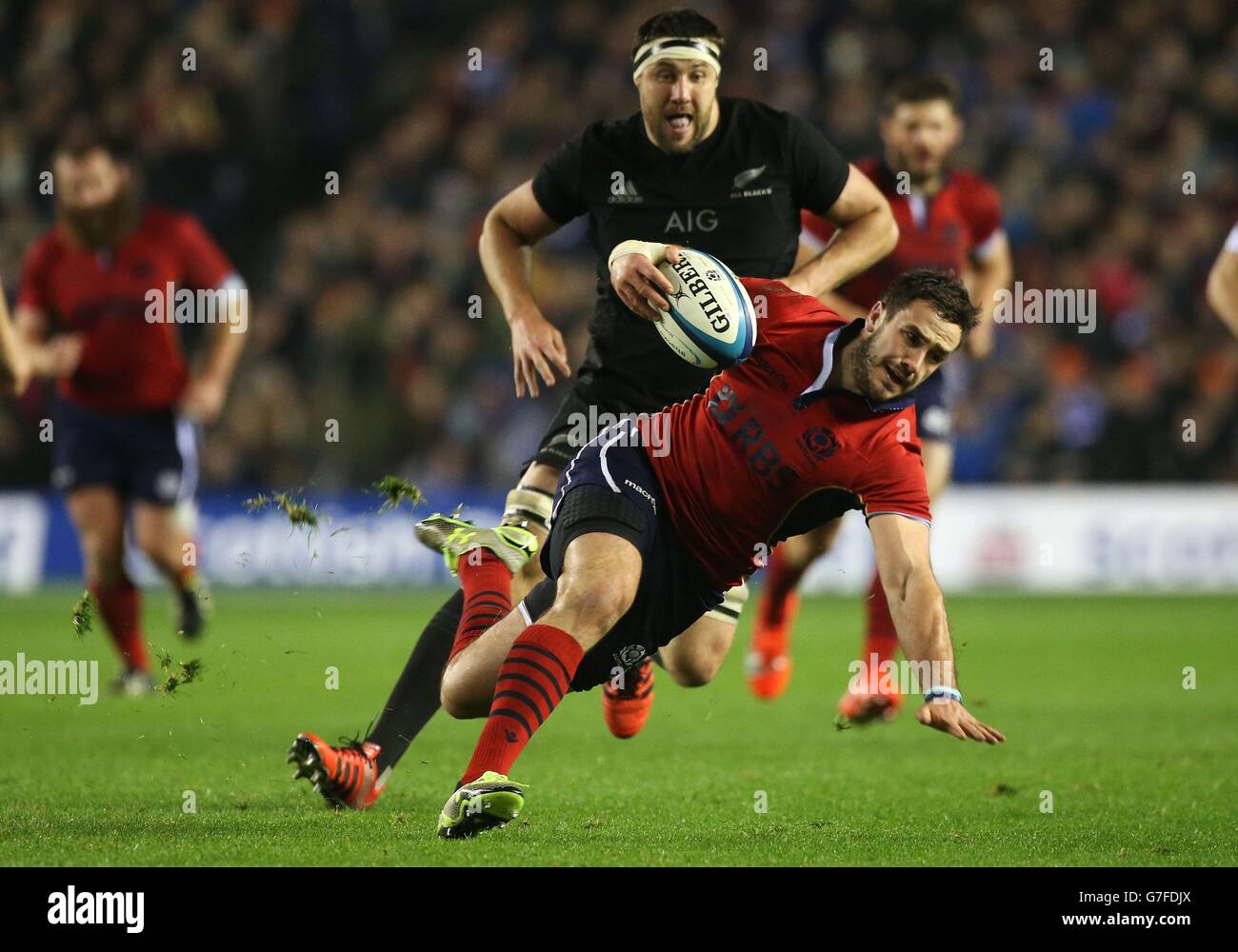 Scotland's Alex Dunbar (front) and New Zealand's Jeremy Thrush during ...