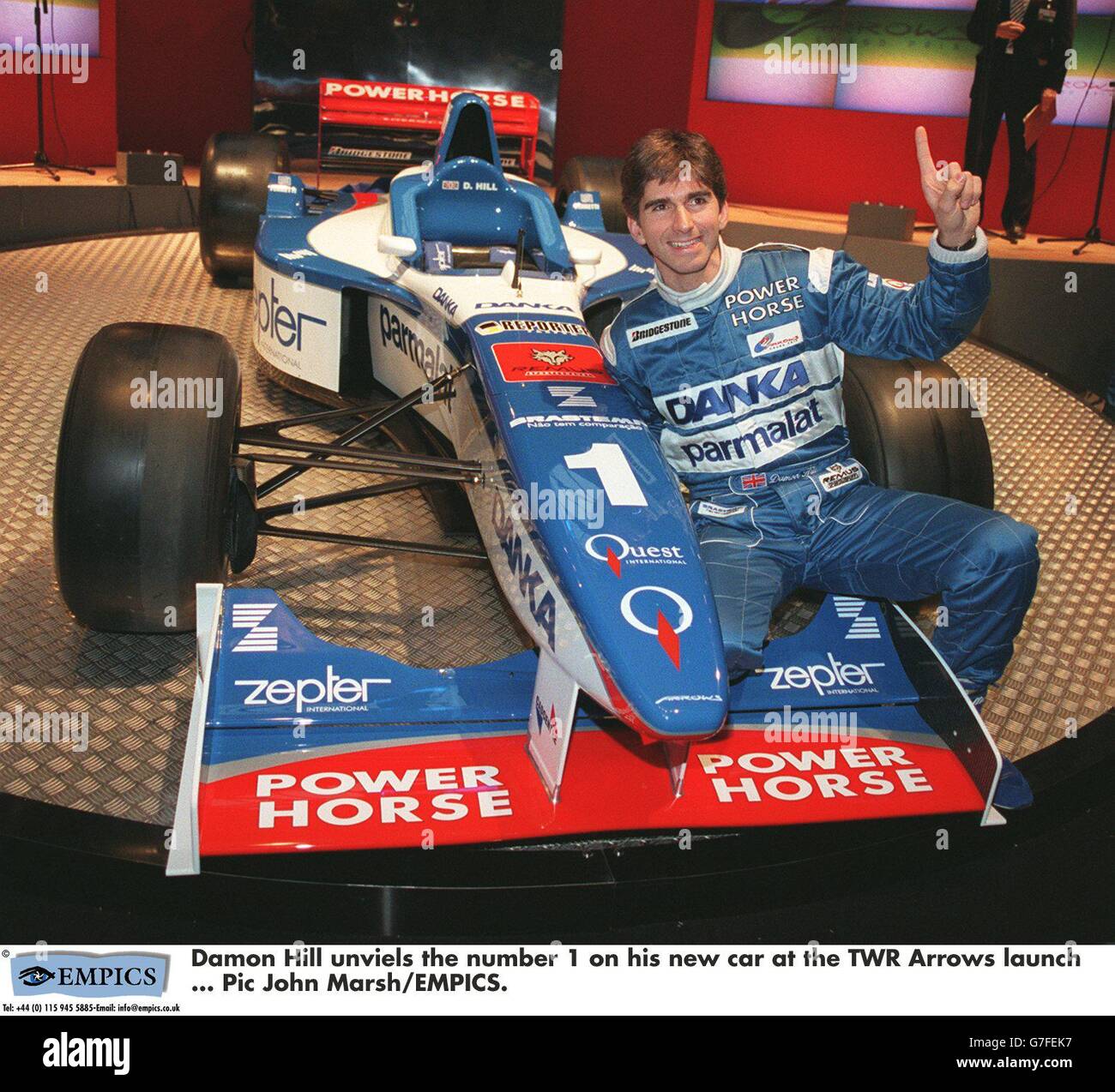 Damon Hill unveils the number 1 on his new car at the TWR Arrows launch ...