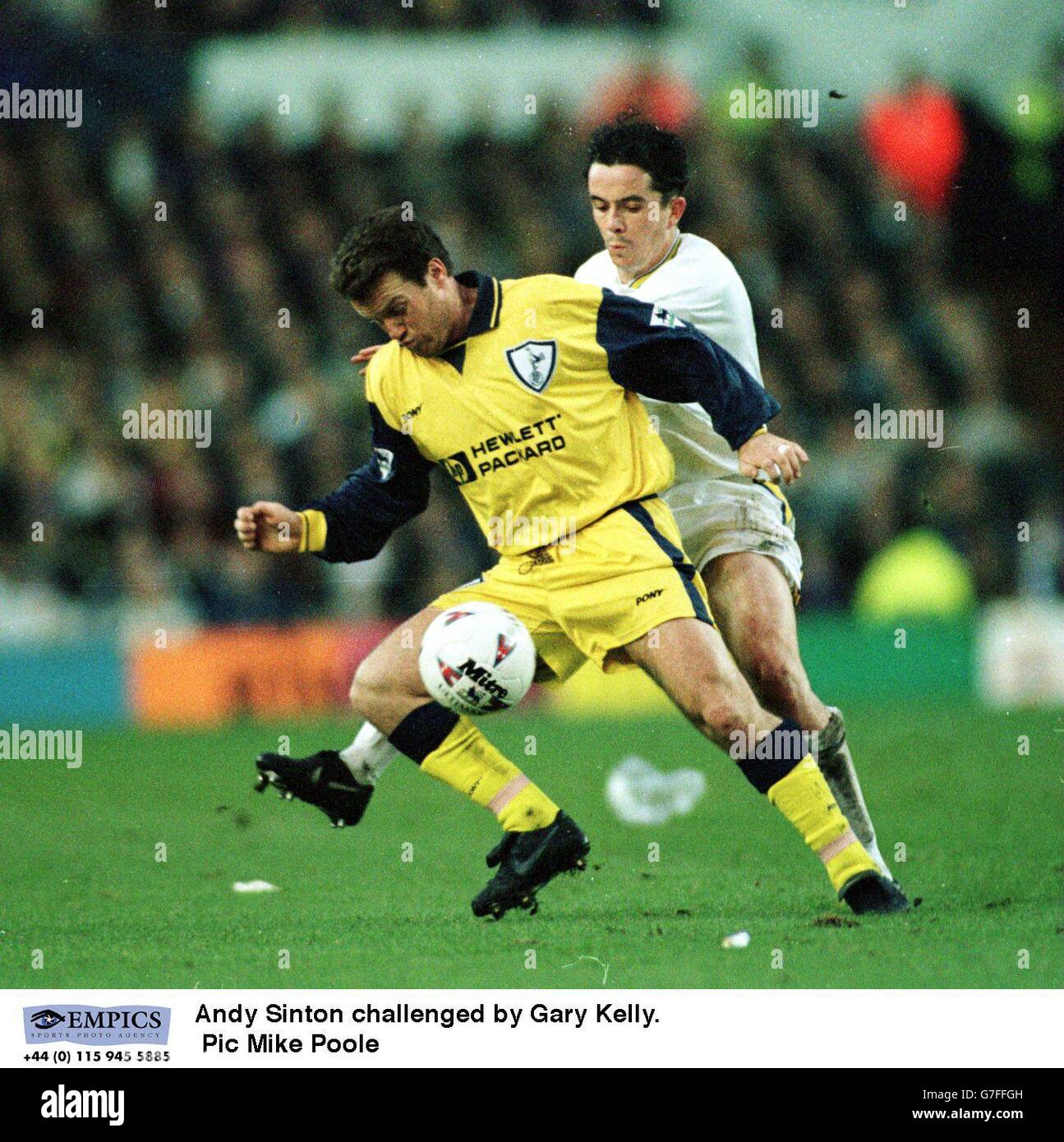 Soccer - Leeds v Spurs. Andy Sinton challenged by Gary Kelly Stock ...