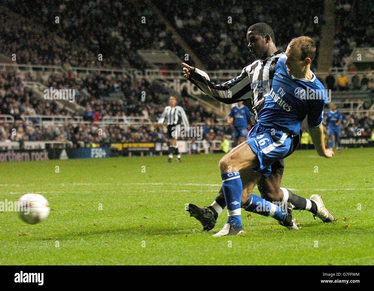 Arjen Robben of Chelsea (right) beats Titus Bramble of Newcastle United ...