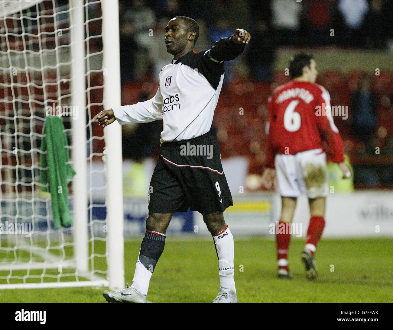 Fulham's Andrew Cole celebrates after he scores the 4th goal against ...