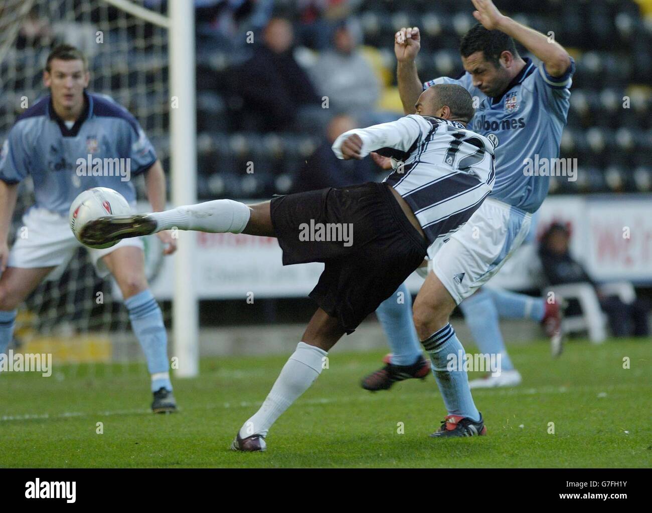 Notts County winger Chris Palmer has a shot on Woking's goal during the ...