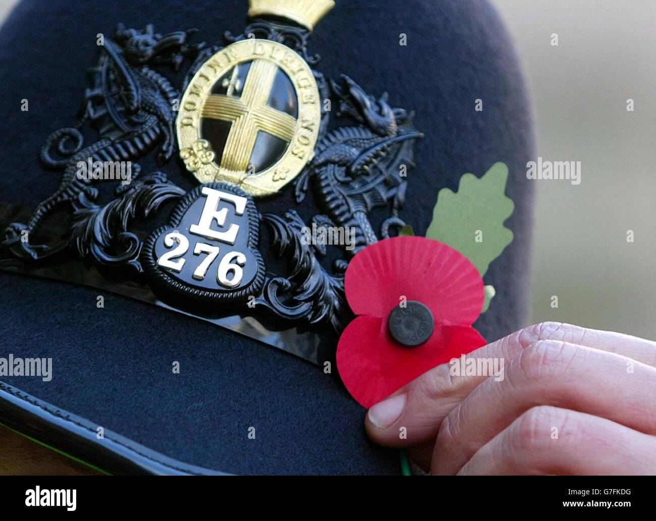 Social poppy remembrance police helmet close up hi-res stock ...