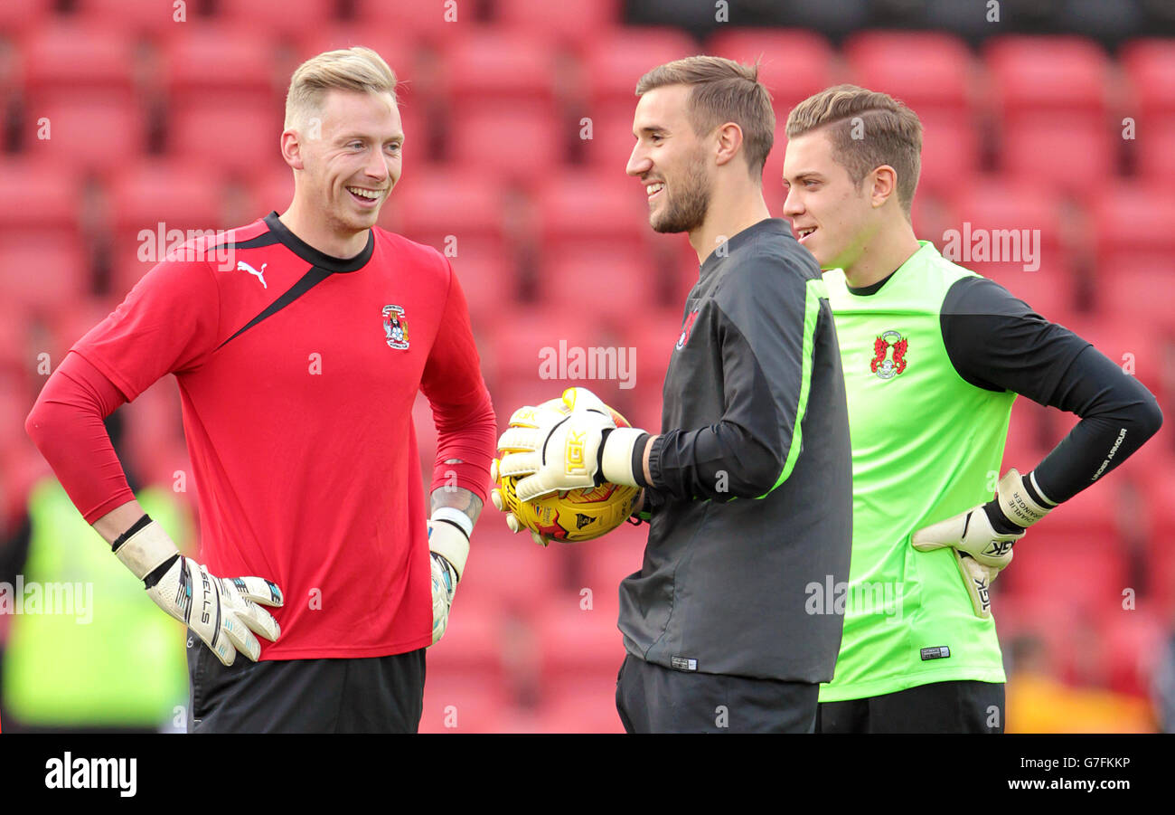 Coventry City goalkeeper Ryan Allsop (left) speaks with Leyton Orient ...