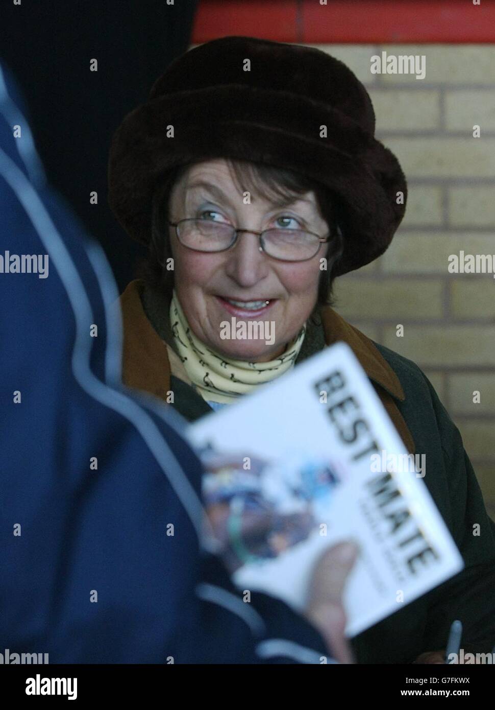 Trainer Henrietta Knight signs copies of her "Best Mate" book before ...