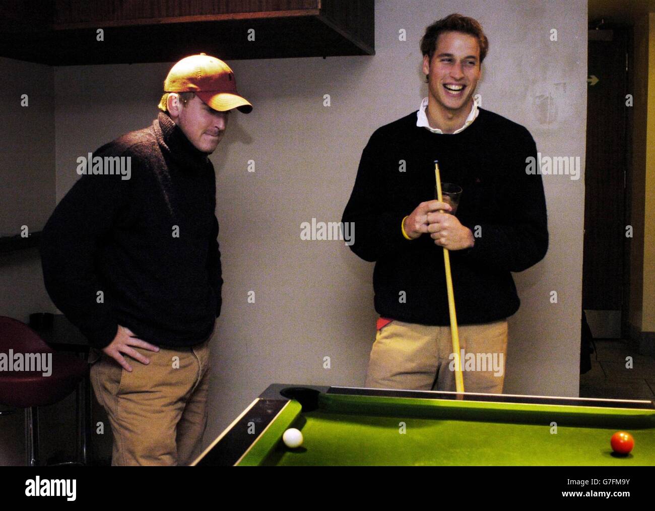 Prince William (right) plays pool with friends at a bar in St Andrews ...