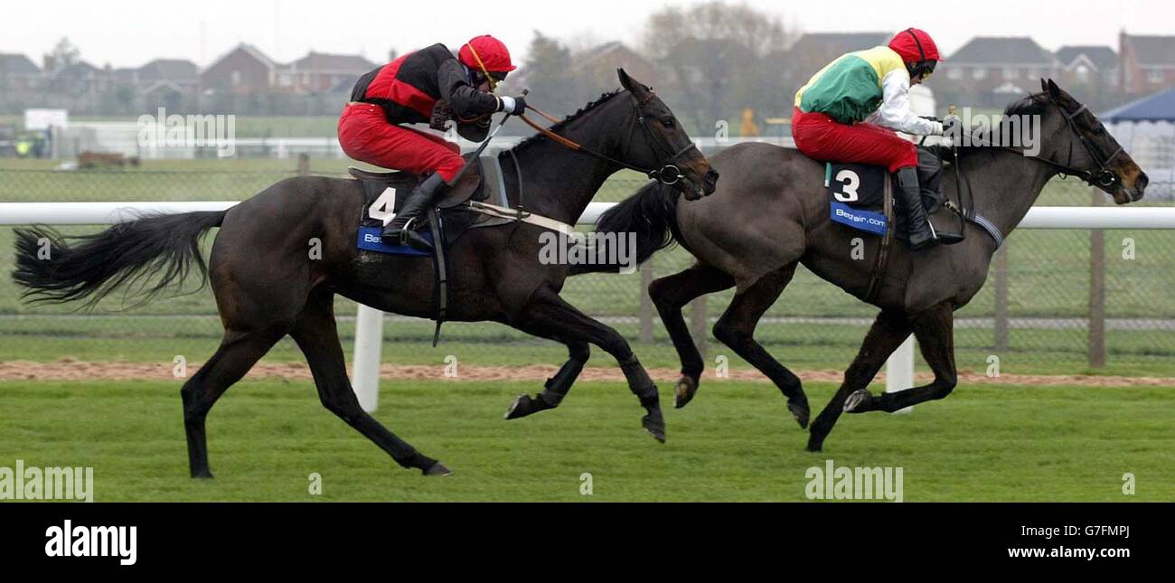 Racing at Aintree - Chauvinist ridden by Marcus Foley Stock Photo - Alamy