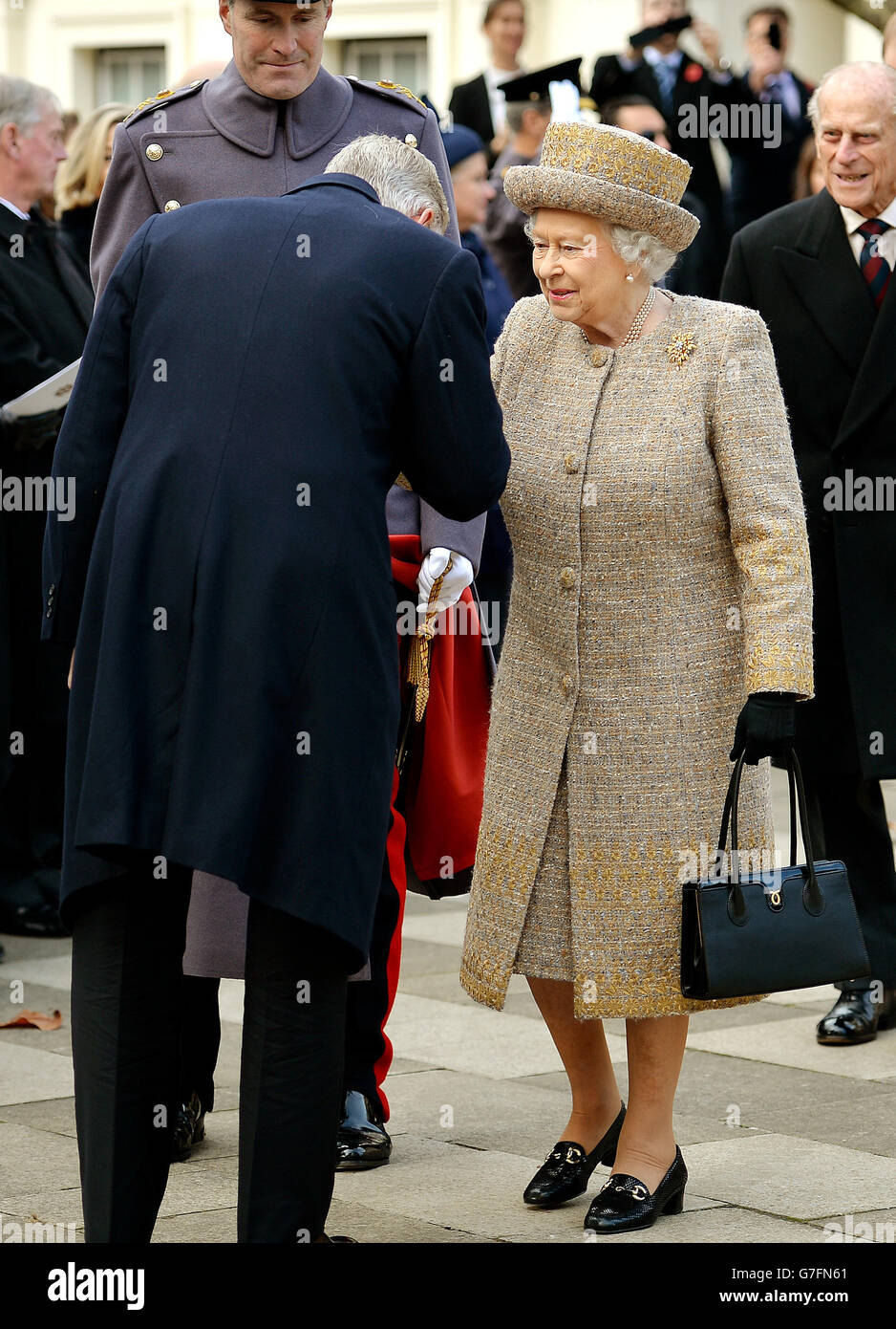 King Philippe of Belgium kisses the hand of Queen Elizabeth II at the ...