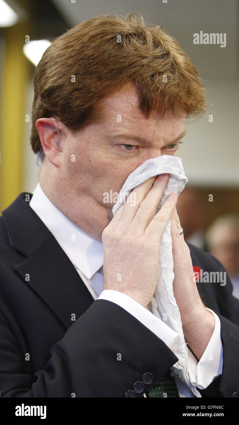 Treasury Chief Secretary Danny Alexander lows his nose during a visit ...