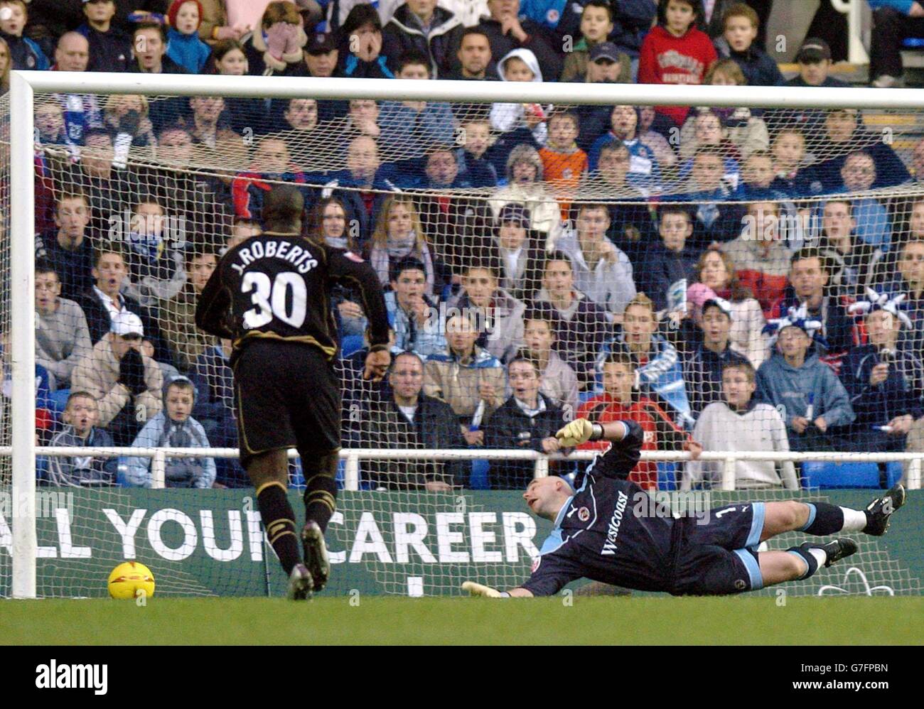 Jason Roberts of Wigan Athletic scores his side's first goal against ...