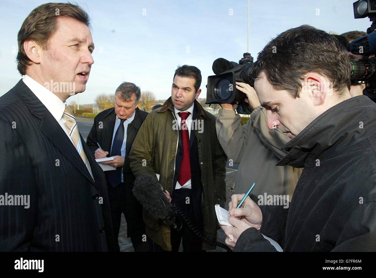 Labour's General Election co-ordinator Alan Milburn (left) speaks to ...