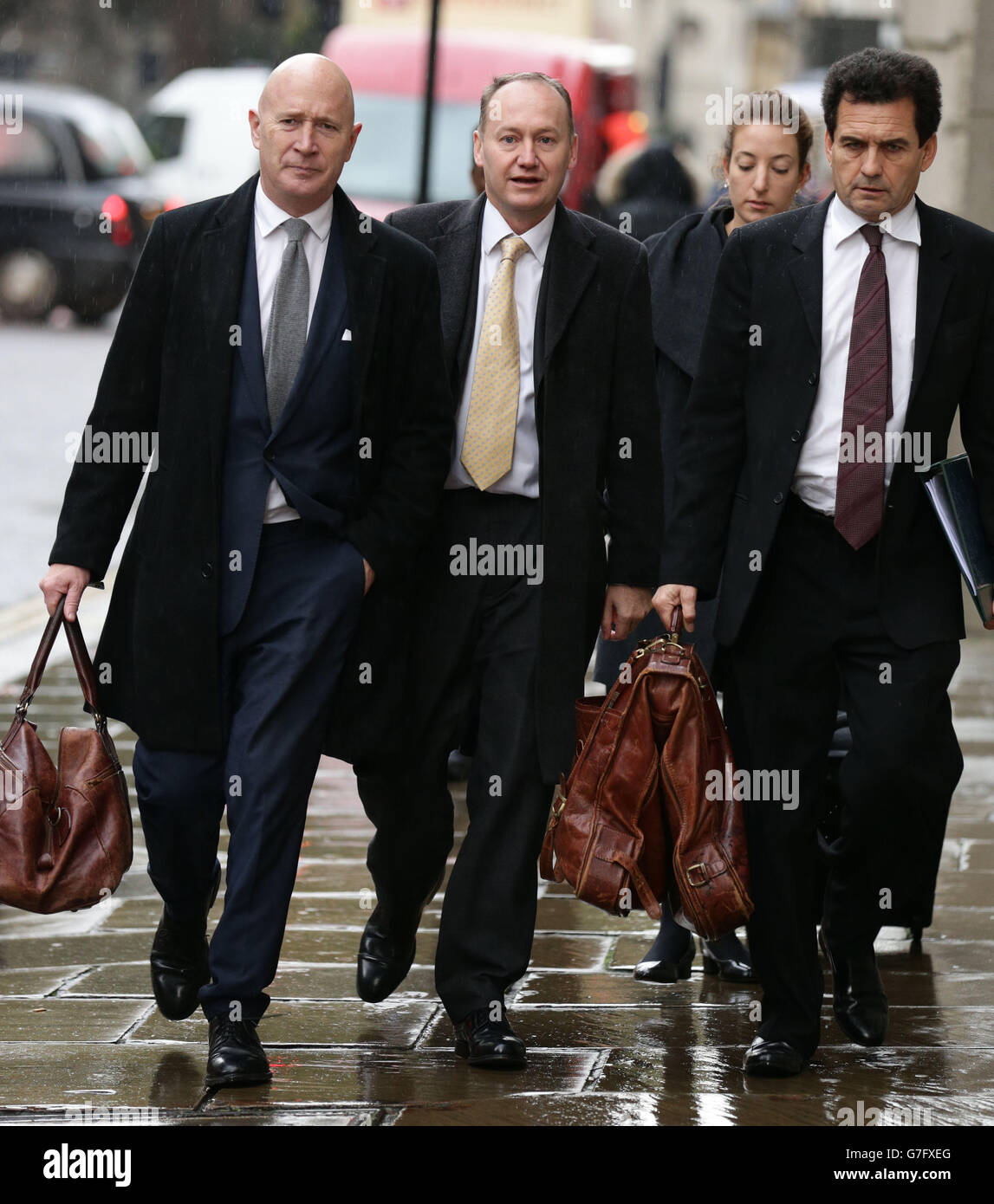 Gary Clarence (second left) arrives at the Old Bailey in London, where ...