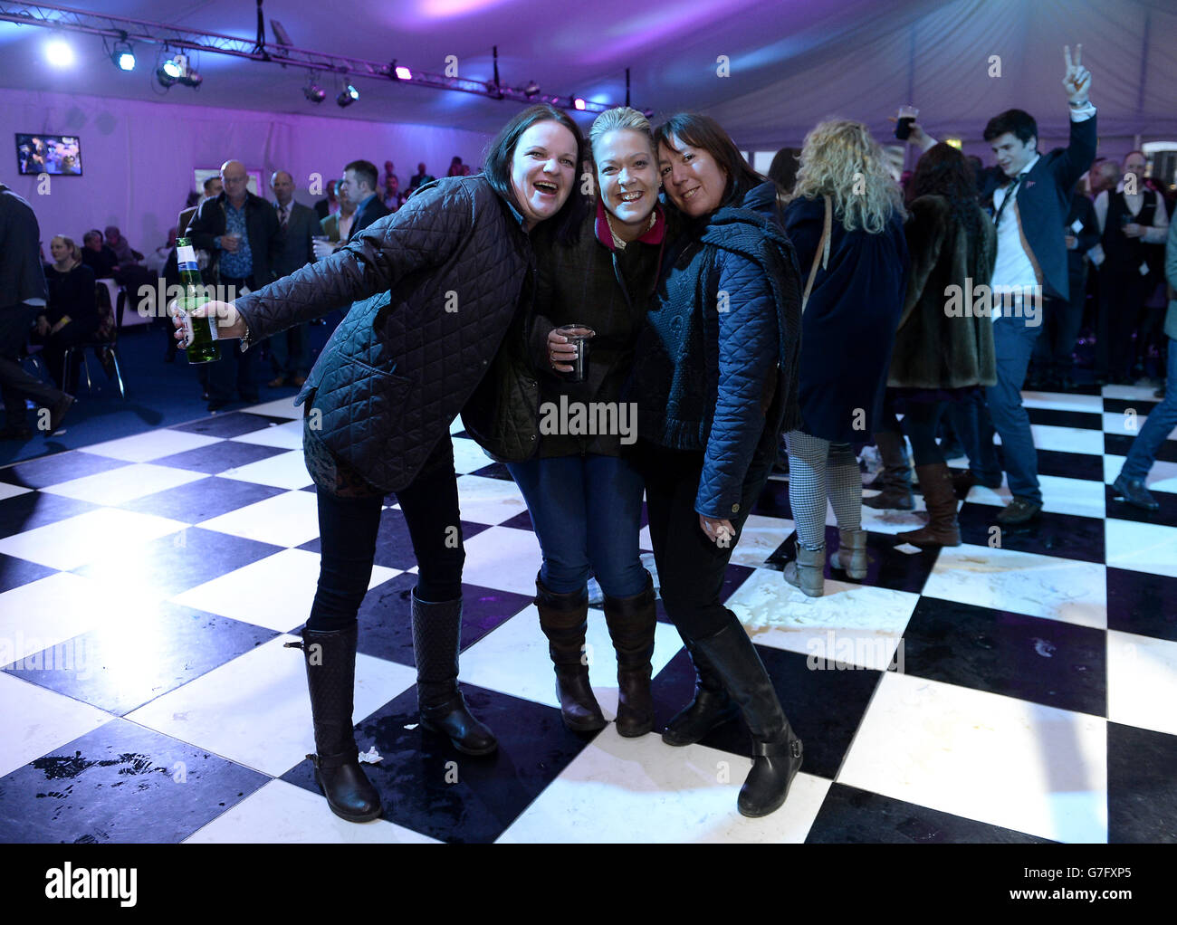 Racegoers dancing at the Final Flight Bar at Cheltenham Stock Photo - Alamy