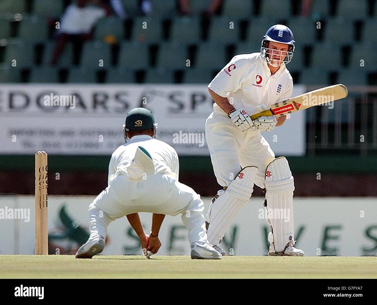 Second left watches the action hi-res stock photography and images - Alamy