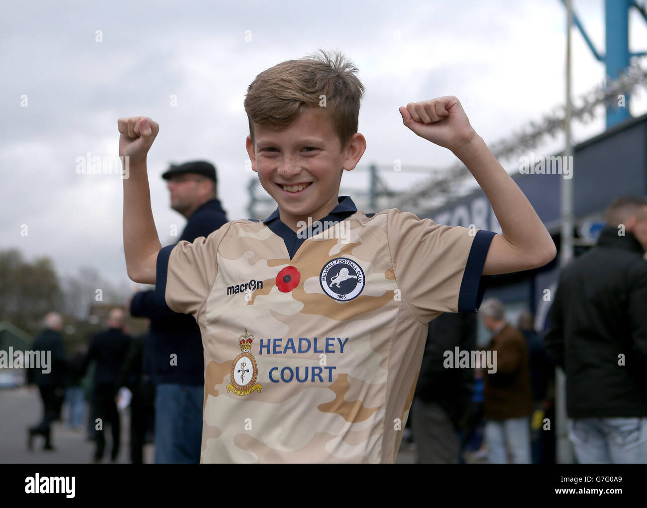 Millwall fans wear their special Remembrance Day commemorative shirts ...