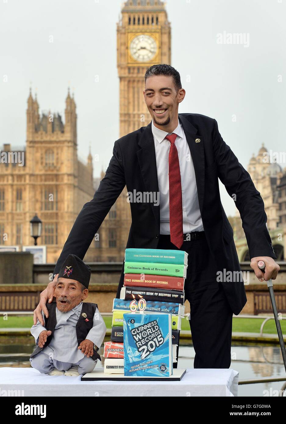 Chandra Dangi, who is 21.5 inches tall, with Sultan Kosen, who is 8 ...