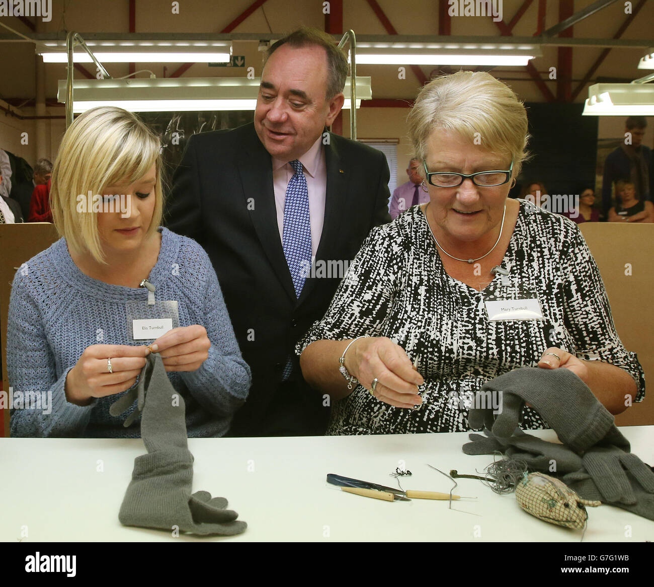 Scotland's First Minister Minister Alex Salmond watches trainee Elis ...