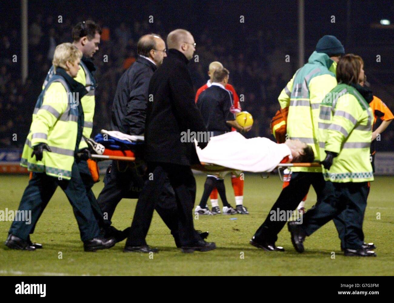Rotherham United's Martin Butler is carried off on a stretcher after ...