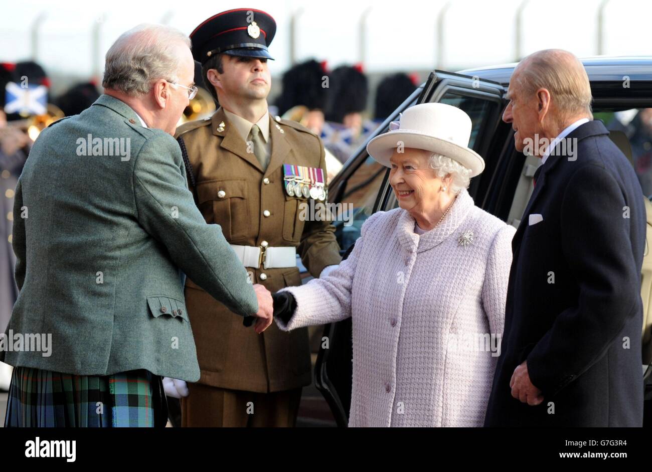 Queen Elizabeth II and the Duke of Edinburgh are met by Jim Royan Vice ...