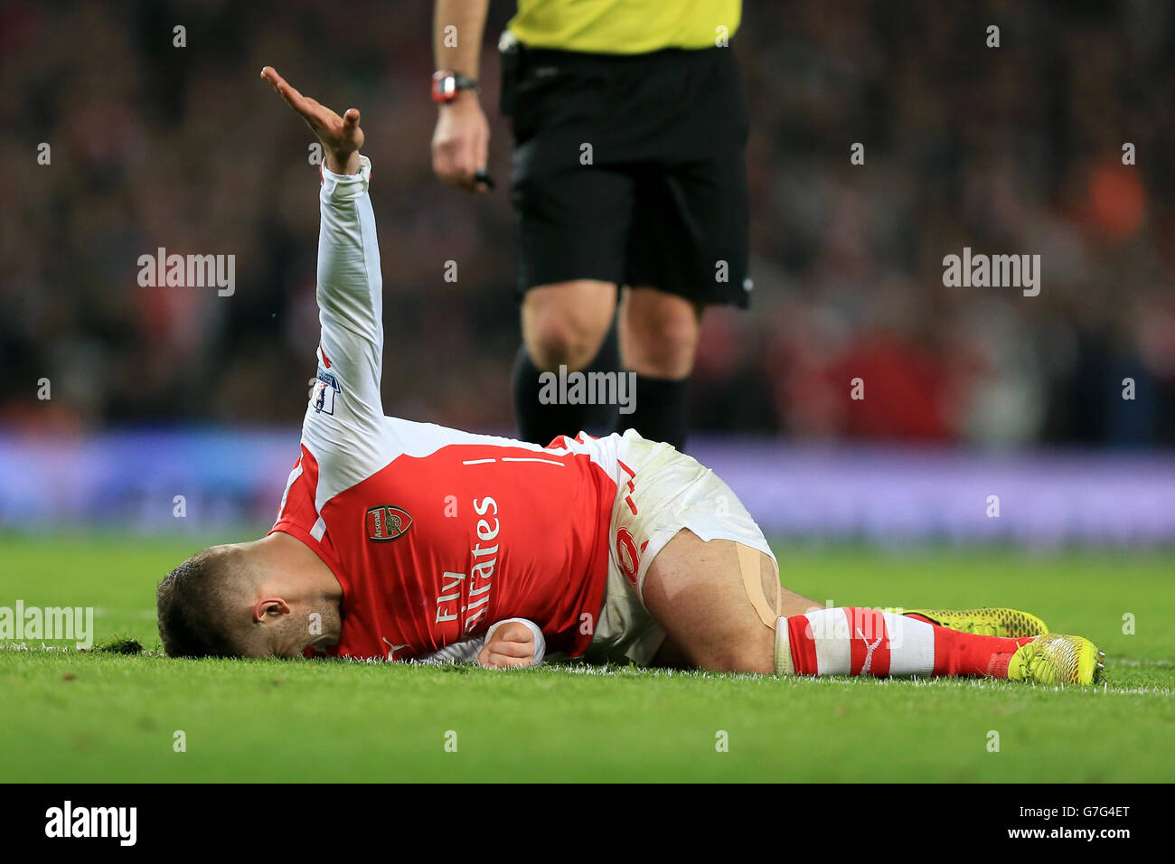 Arsenal's Jack Wilshere reacts after suffering an injury during the ...