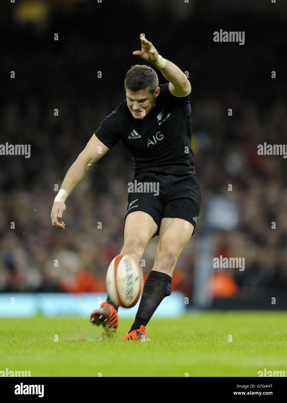New Zealand's Colin Slade kicks a conversion during the Dove Men Series ...