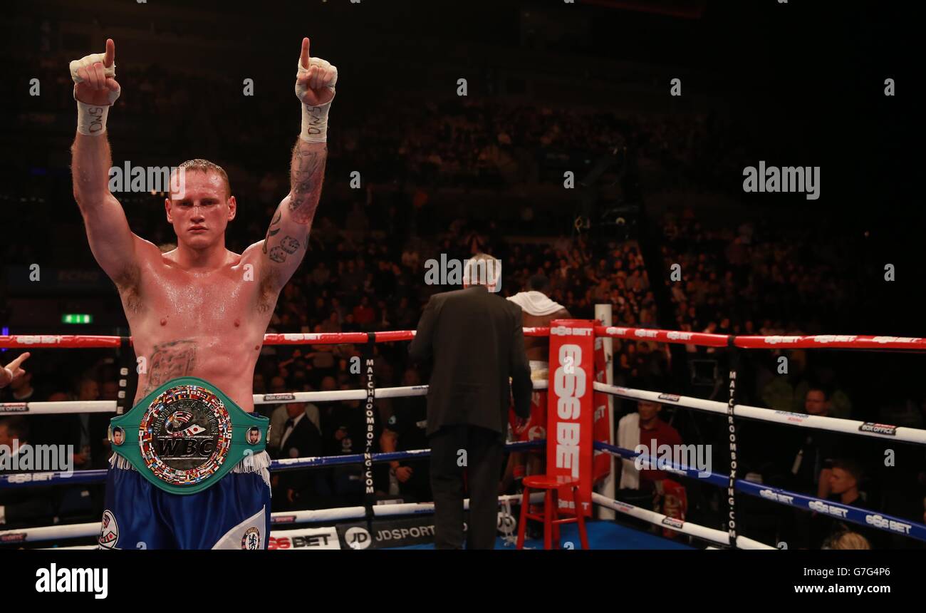 George Groves celebrates winning after knocking down Denis Douglin in ...