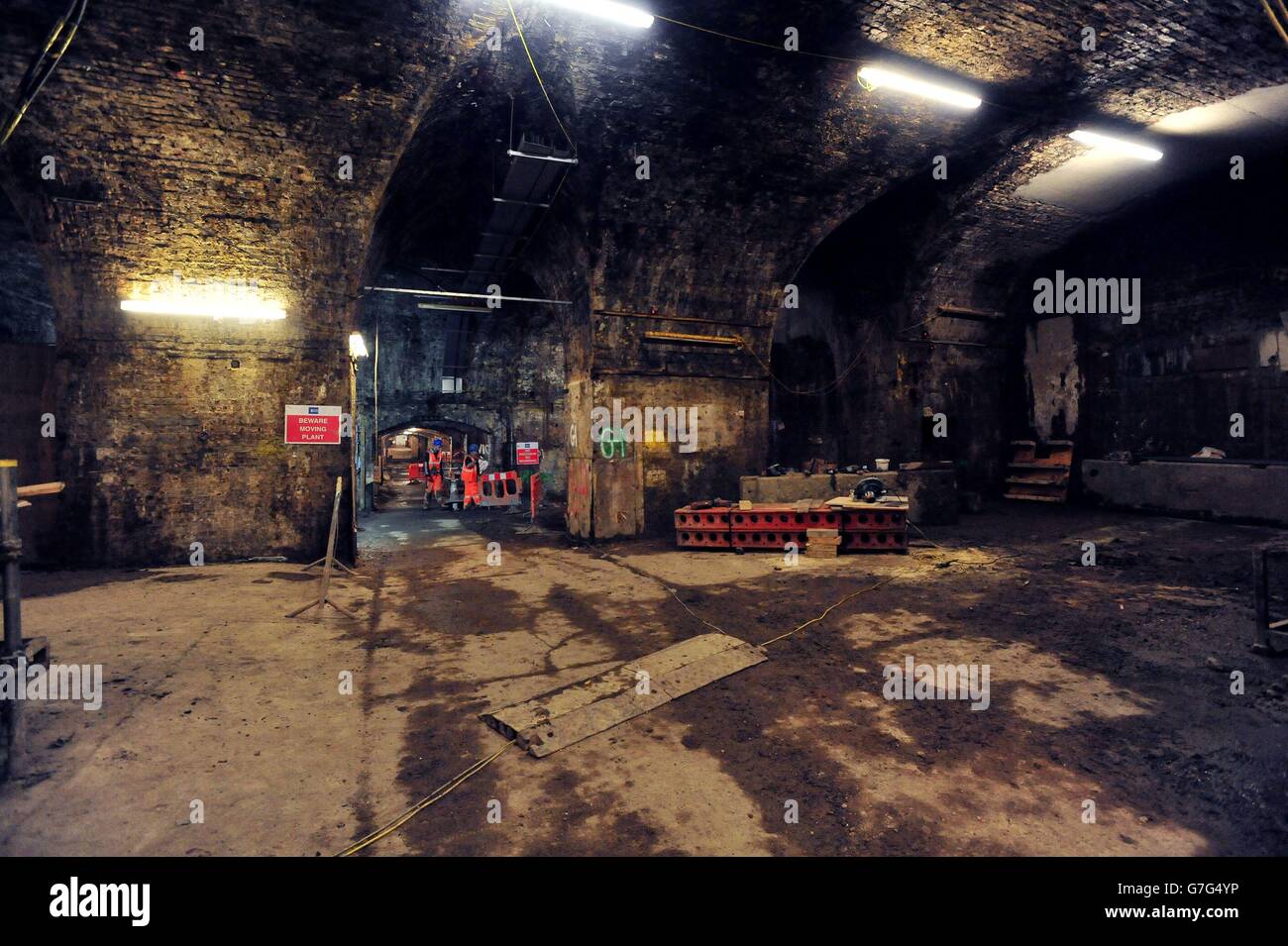 Construction workers in the Victorian arches underneath the tracks at ...