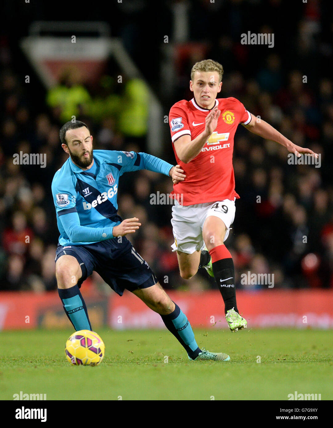 Manchester United's James Wilson and Stoke City's Marc Wilson (left ...