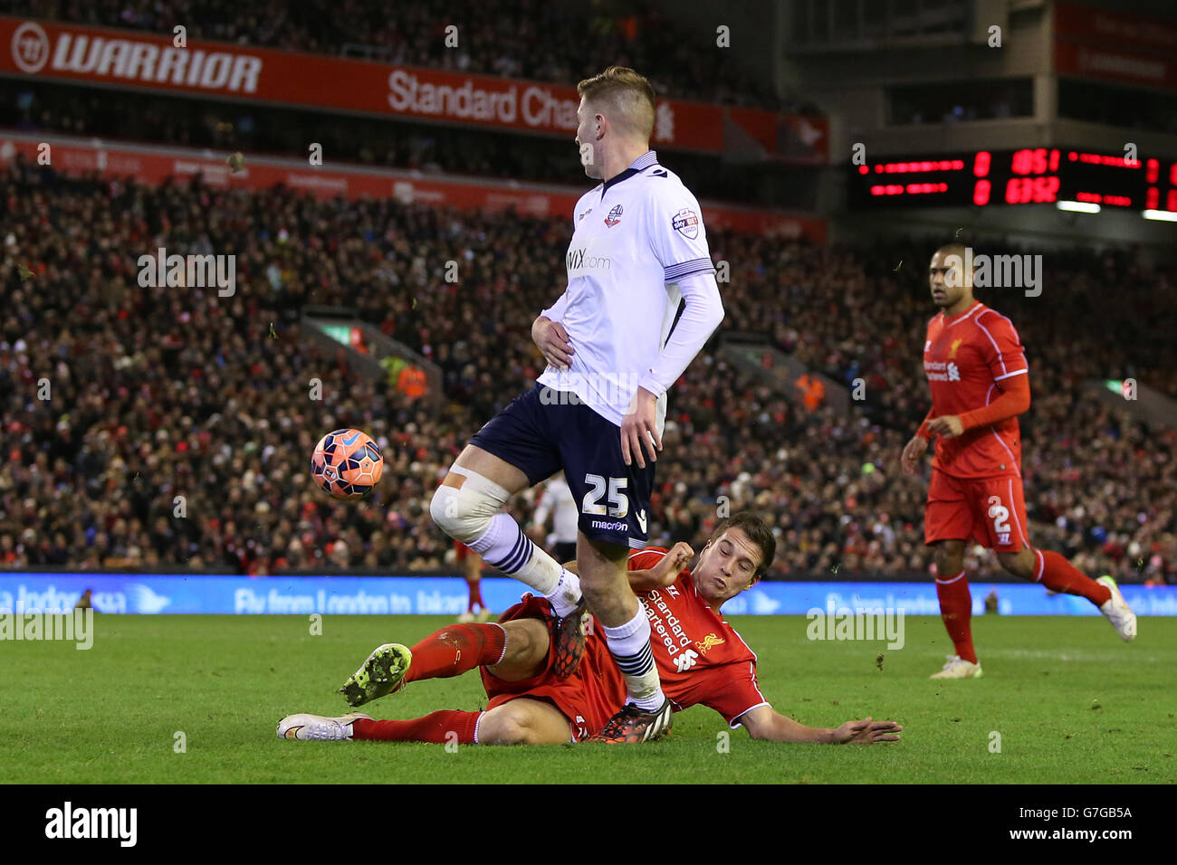 Liverpool's Javi Manquillo and Bolton Wanderers' Joshua Vela (front ...