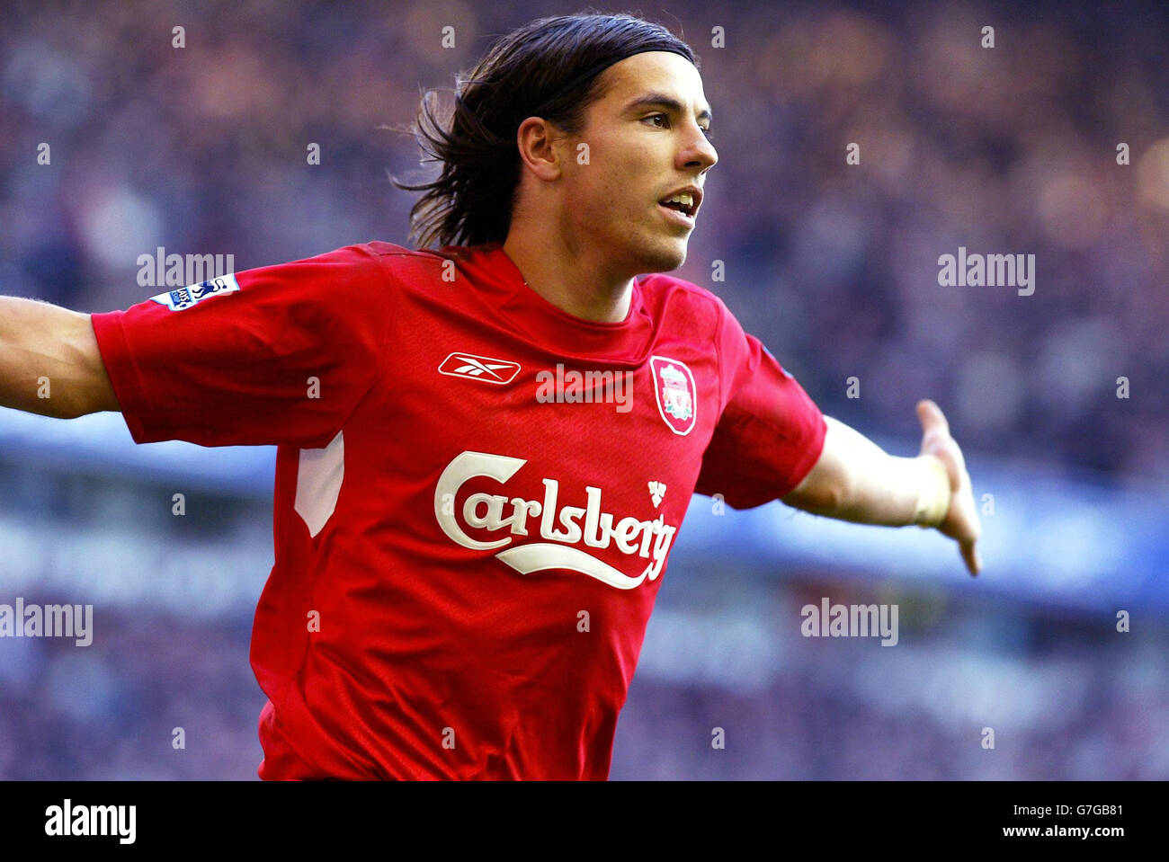 Milan Baros celebrates scoring the third goal, during the Barclays ...