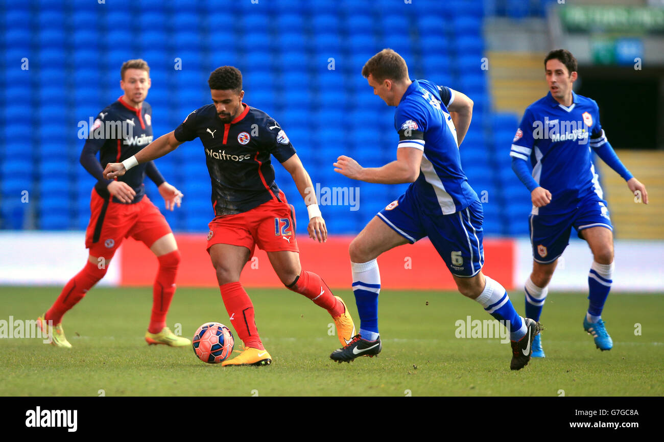 Reading's Garath McCleary takes on Cardiff City's Ben Turner (second ...