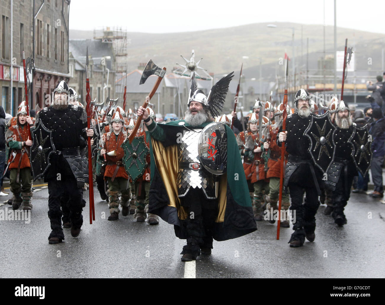 Guizer Jarl Neil Robertson leads members of the Jarl Squad dressed in ...