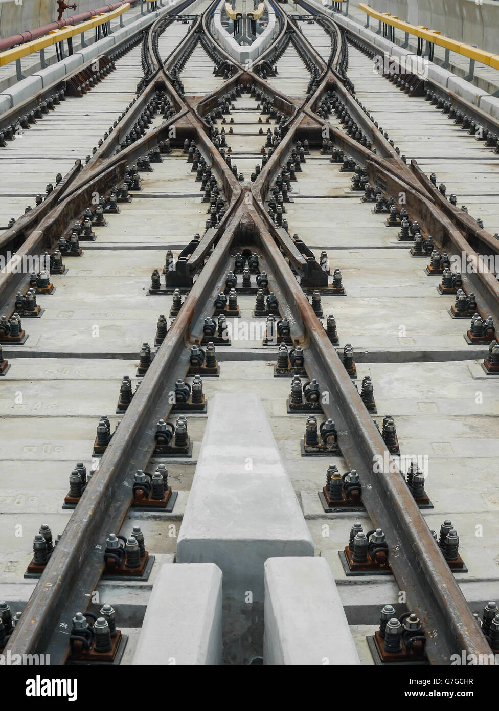 The railway track at scissor turnout section Stock Photo - Alamy