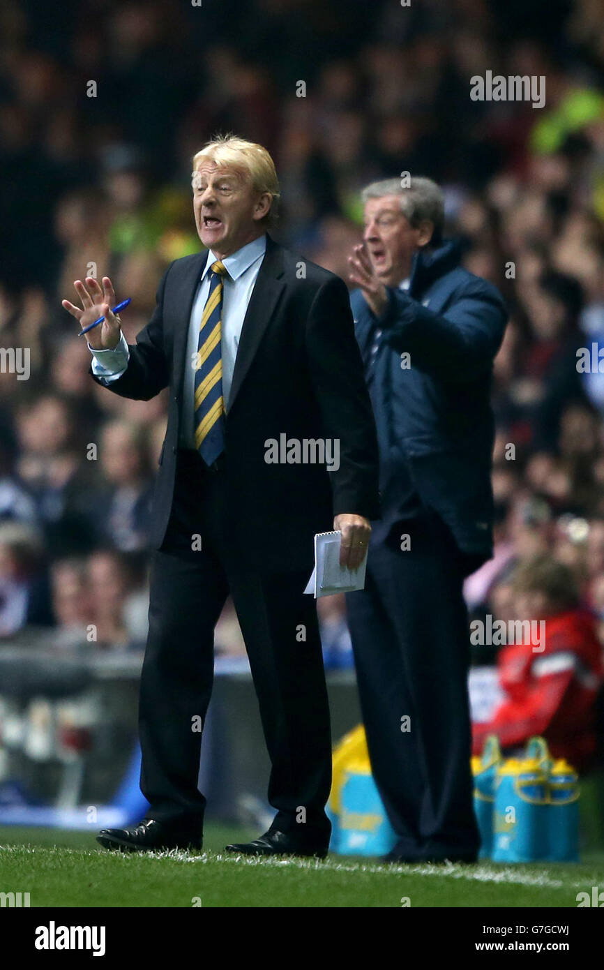 Scotland manager Gordon Strachan (left) and England manager Roy Hodgson ...