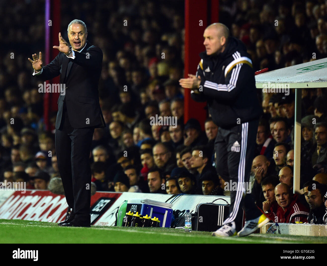 Fulham's Kit Symons and (left) and Brentford Manager Mark Warburton ...