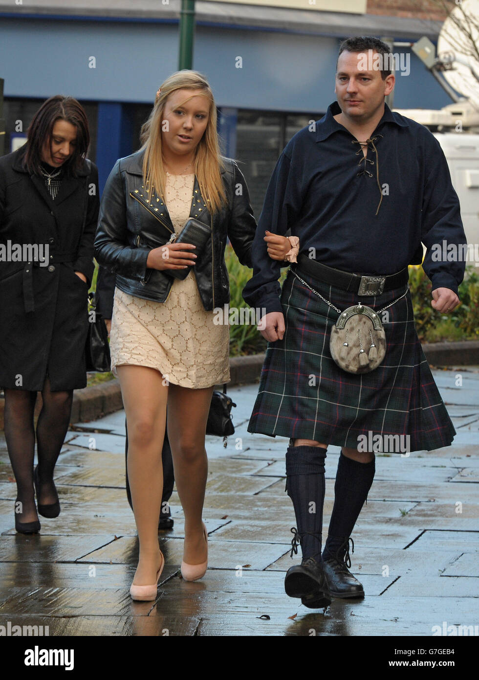 Bethany Haines (centre) arrives with an unidentified male at a memorial ...