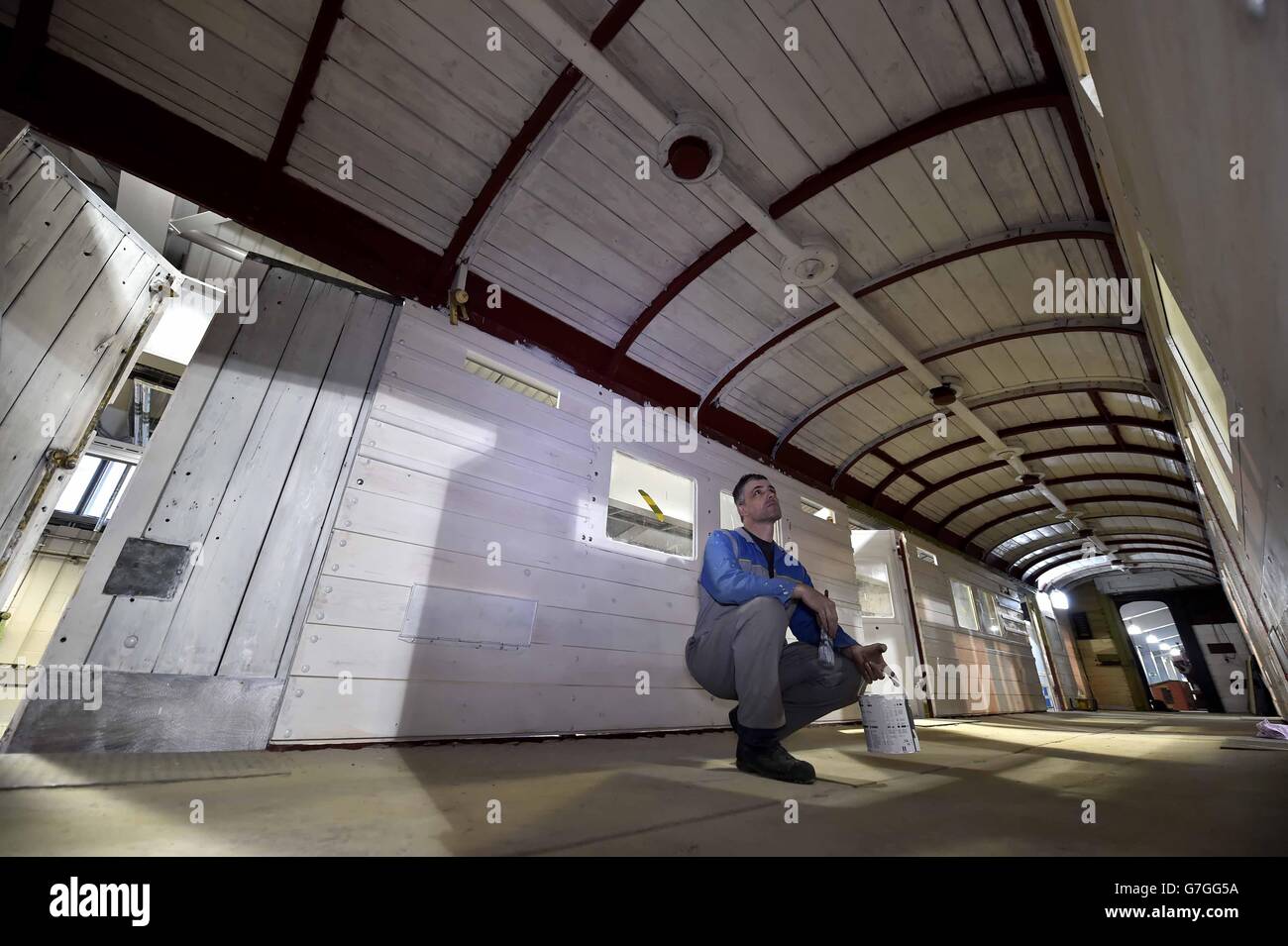 Ian Mathews puts the finishing touches to the restoration of the ...