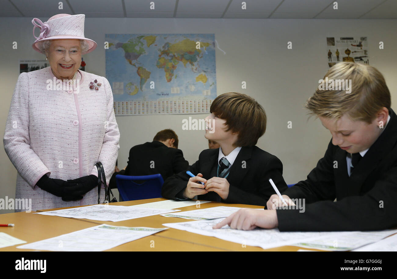 Queen Elizabeth II smiles as she meets student Josh Jacques, 11 ...